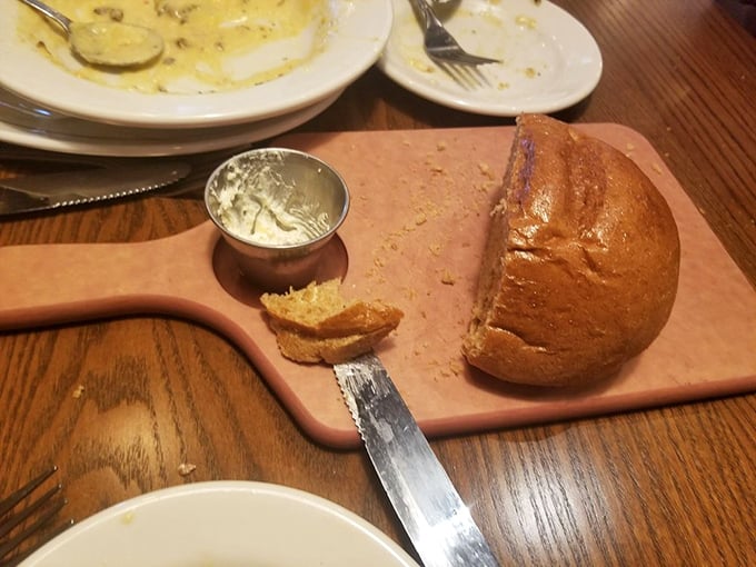 The famous beer bread&mdash;golden, crusty, and ready for its butter bath. Carb counters, look away now; this is not your moment.