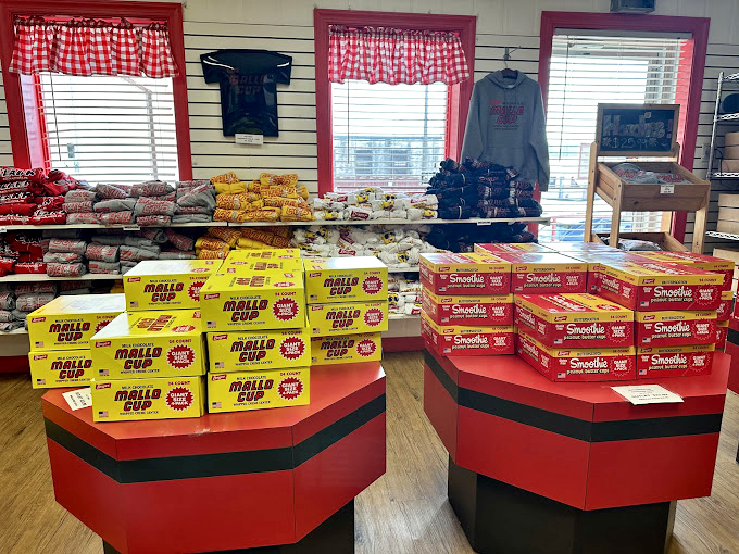 The octagonal display table&mdash;geometric proof that the shortest distance between you and happiness is a straight line to Boyer's boxed candies.
