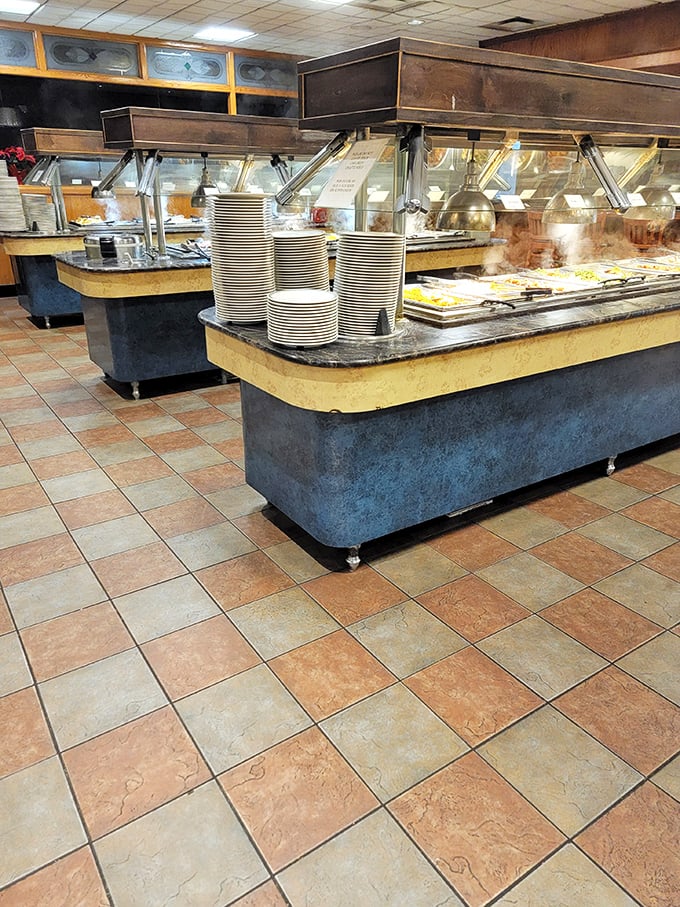 The buffet battlefield, where dreams are made and diets are forgotten. Clean stations, stocked trays, and an impressive array of options await.