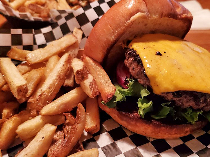 A burger that requires both hands and a strategy. Those hand-cut fries aren't just sides&mdash;they're supporting actors deserving of their own award.