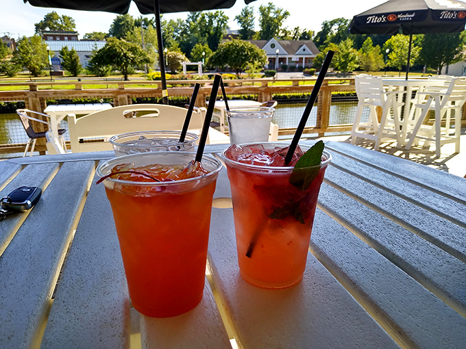 Sunset cocktails on the deck at Abbott's—where the drinks are as colorful as the conversation. This is what vacation mode looks like in liquid form.