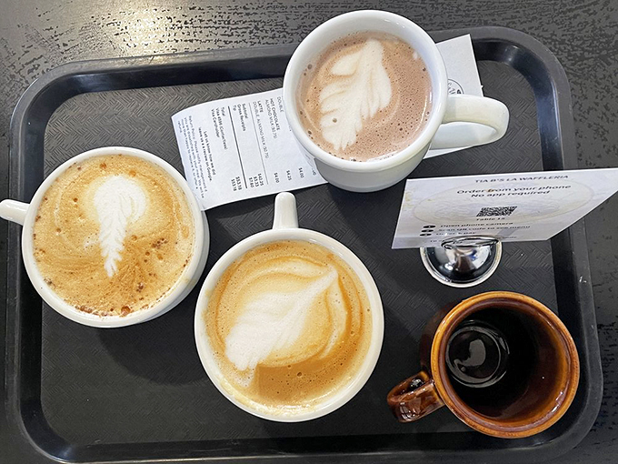 Coffee art so pretty you almost don't want to drink it. Almost. Because caffeine and waffles are breakfast's power couple.