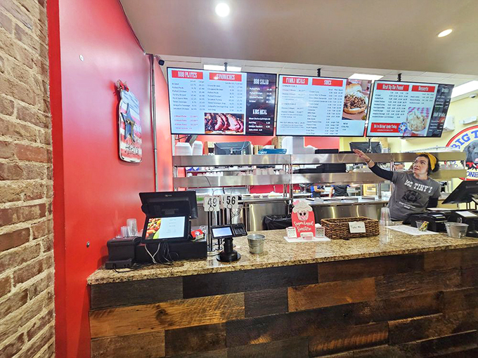 Behind that counter lies barbecue alchemy. The staff aren't just servers&mdash;they're gatekeepers to a smoky paradise where patience transforms tough cuts into tender treasures.