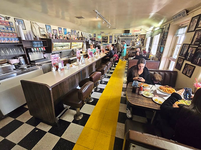 The counter seating&mdash;where strangers become friends over coffee refills and where the real America happens between bites.