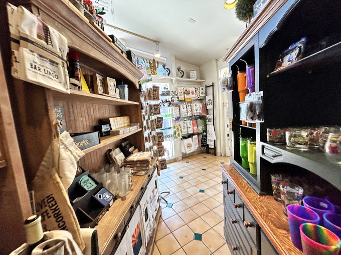 A narrow passageway lined with enticing merchandise proves that in the best gift shops, every inch of space serves a purpose&mdash;to make you reach for your wallet.