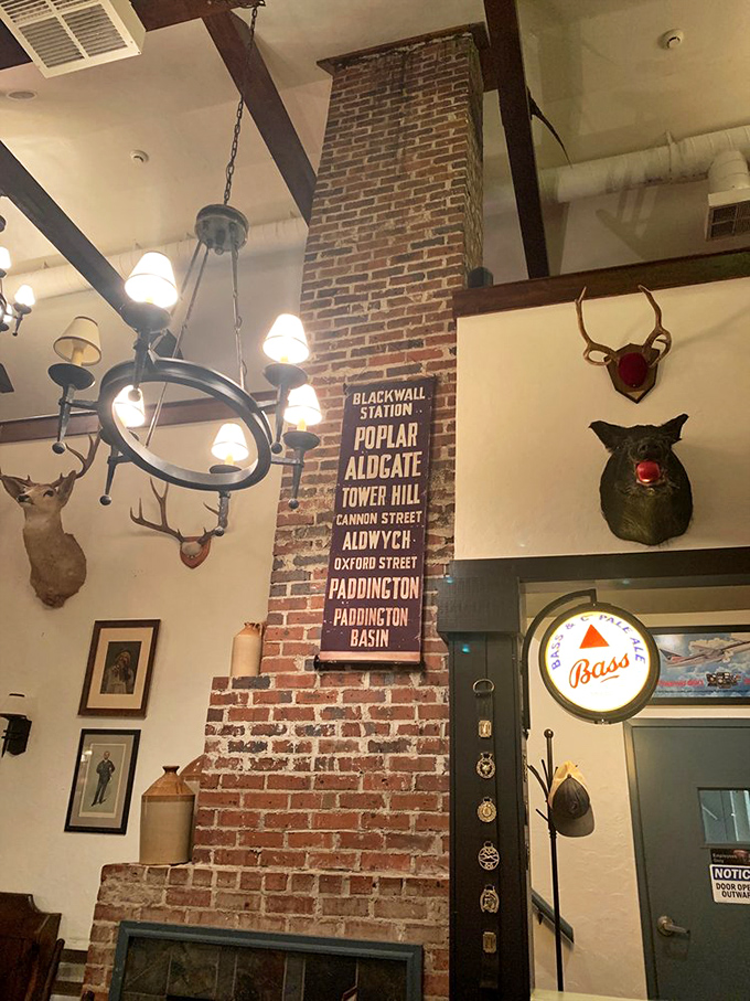 Exposed brick chimney and London Underground signs transport you straight to England. Even the mounted deer heads seem to have British accents.