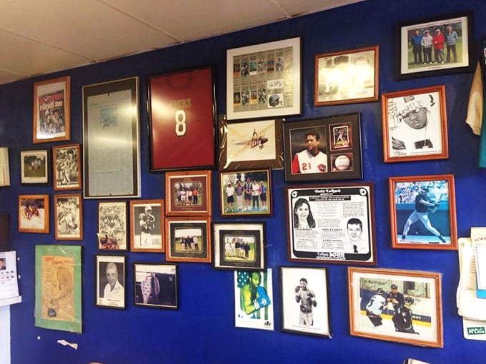 The wall of fame tells stories of sports legends and local heroes, creating a community scrapbook that seasons every sandwich with nostalgia.