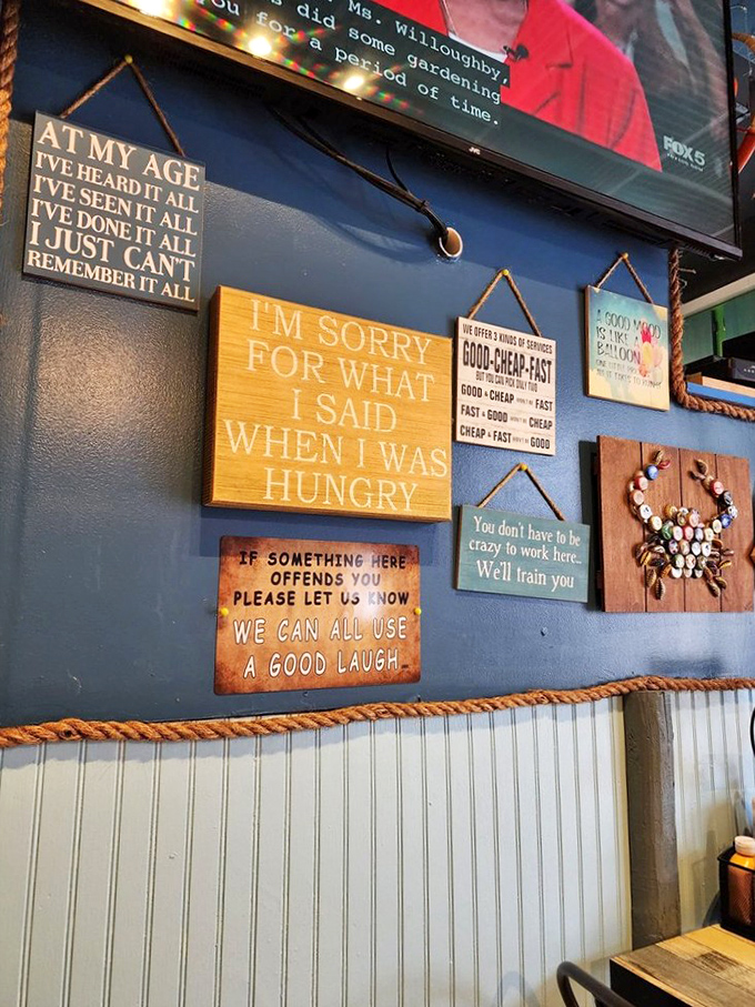 The wall signs perfectly capture the restaurant's personality&mdash;witty, self-aware, and absolutely correct about how we all behave when hungry.