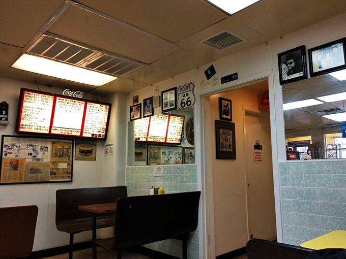 Route 66 memorabilia and decades of burger history create the perfect backdrop for a meal that hasn't changed because it doesn't need to.