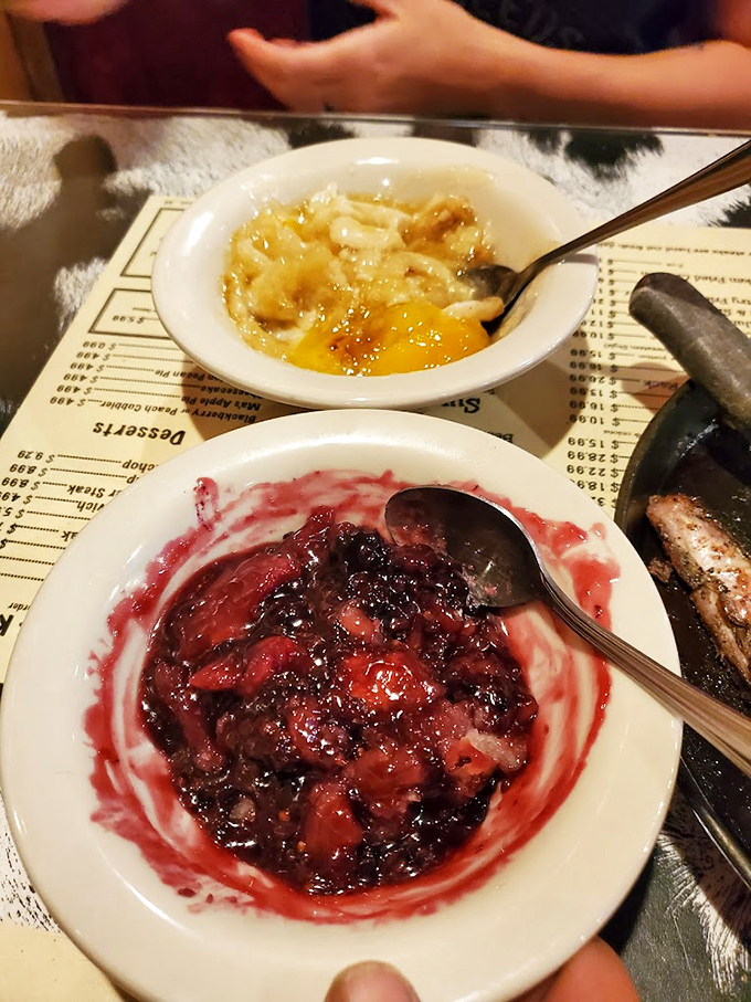 Dessert at Brangus proves that happiness comes in bowls: warm cobbler and peach perfection that would make your dentist weep with professional concern.