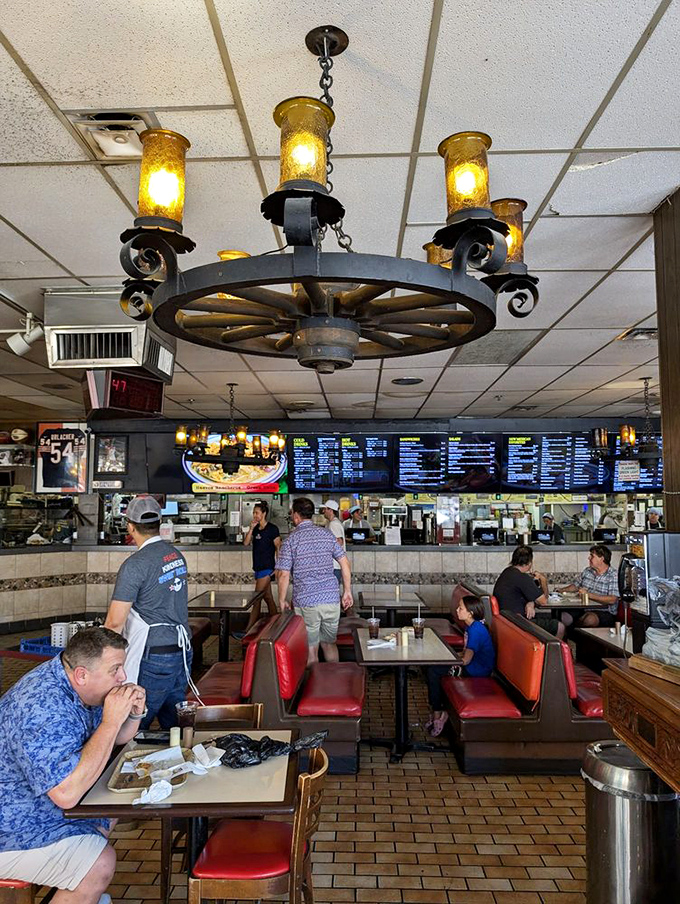 Under the glow of wagon wheel lights, regulars and tourists unite in the universal language of "mmmmm."
