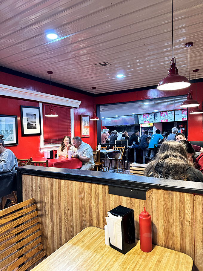 Happy diners lost in burger euphoria. The expressions on their faces tell you everything you need to know about Johnny's legendary status.