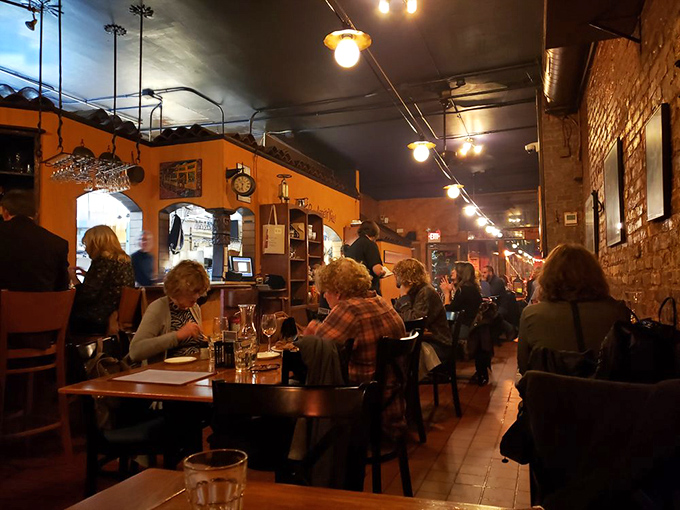 The gentle murmur of satisfied diners creates the perfect soundtrack against exposed brick walls and warm lighting.