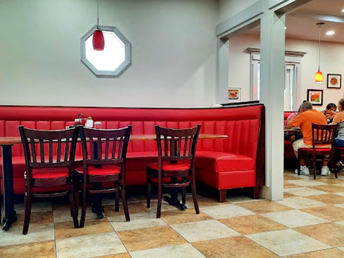 Comfortable booths wrapped in fire-engine red vinyl invite long conversations, second cups of coffee, and the occasional "well, maybe just one more pancake."
