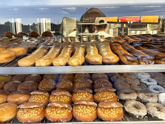 The display case&mdash;a museum of fried dough where every shelf tells a different delicious story worth the drive to Glendora.