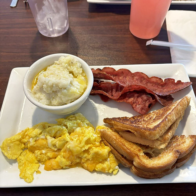 Beyond waffles lies a world of breakfast classics. Perfectly scrambled eggs, crispy bacon, and grits&mdash;the supporting cast deserves applause too.