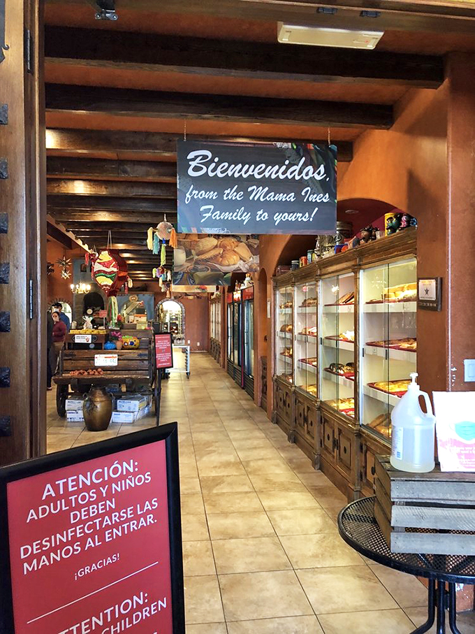 The sign promises "Bienvenidos"&mdash;and delivers. Mama Ines doesn't just serve food; it offers a sense of belonging with every bite. 
