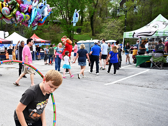 Spring festivals transform parking lots into community celebrations, where balloons, smiles, and local flavors create memories that outlast the season.