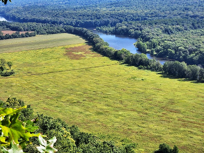 The Delaware River Valley unfolds like a verdant quilt. This panoramic view reminds us that Raymondskill Falls is just one jewel in Pennsylvania's treasure chest of natural wonders. 