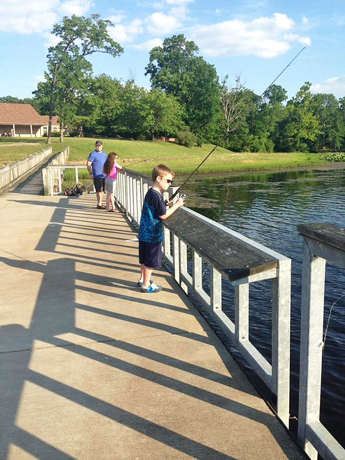 Fishing lessons and life lessons happening simultaneously. Three generations learning patience pays off &ndash; both with fish and with family.