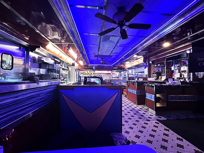 Diner perspective: where neon meets nostalgia, ceiling fans keep the comfort food aromas circulating, and every booth feels like the best one.