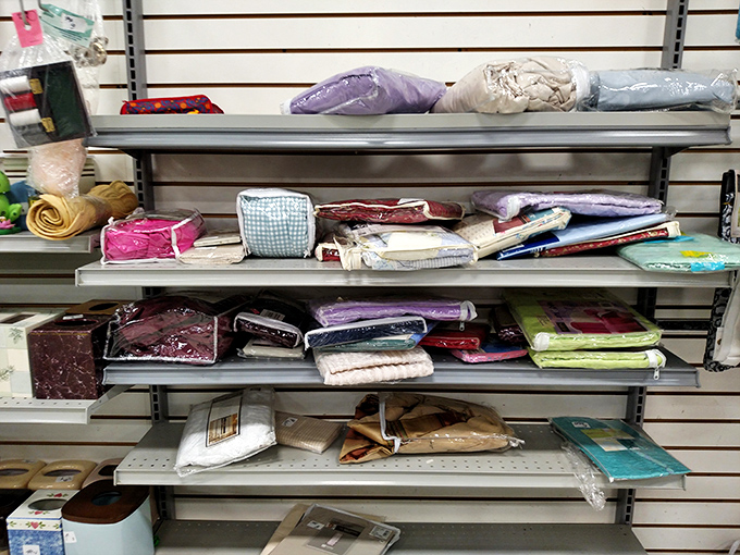 Textile paradise for the practical dreamer. Bedding, tablecloths, and fabric treasures await those who can envision second lives for gently used linens. P