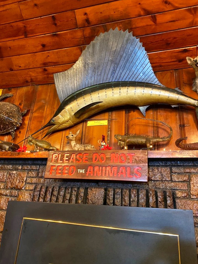 The bar area blends rustic charm with modern comforts &ndash; where wood-paneled walls, American flags, and flat-screen TVs create the perfect trifecta of hospitality.