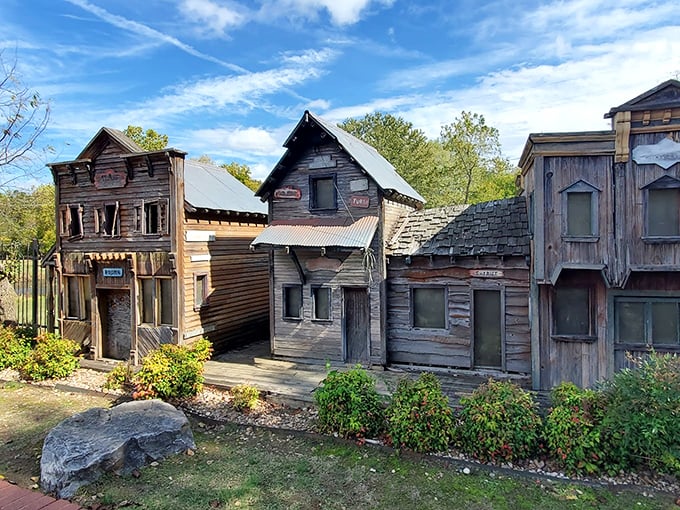The Old West village—where you half expect tumbleweeds to roll by. These weathered buildings have witnessed countless showdowns at the mini-golf corral.