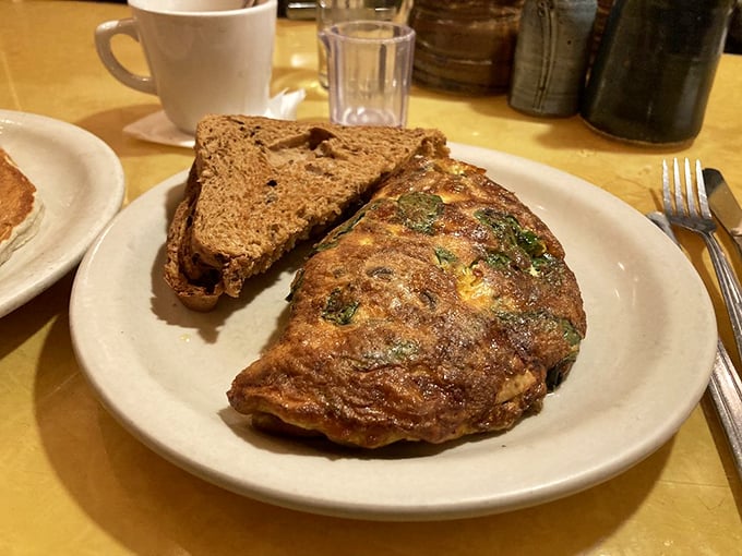 This isn't just an omelet&mdash;it's a masterclass in egg architecture, with that perfect fold and golden exterior that whispers "good morning" in the most delicious way.