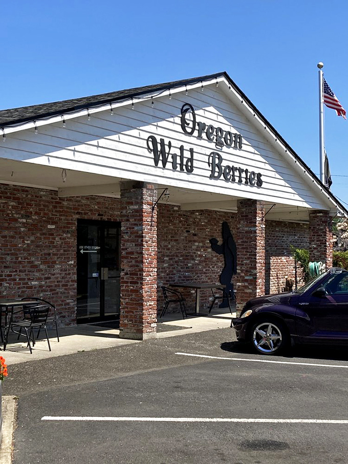 Another view of the welcoming exterior where those galvanized planters burst with flowers, nature's way of saying "good food inside."