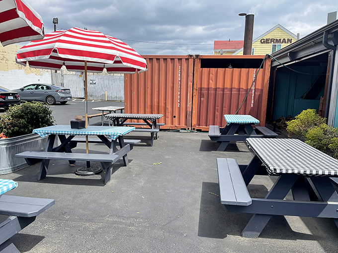 Al fresco dining with checkered tablecloths and a shipping container backdrop&mdash;Portland's perfect blend of rustic and industrial chic.