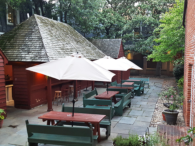 The courtyard offers a peaceful colonial retreat from modern chaos. Those umbrellas would have been considered witchcraft in 1785.