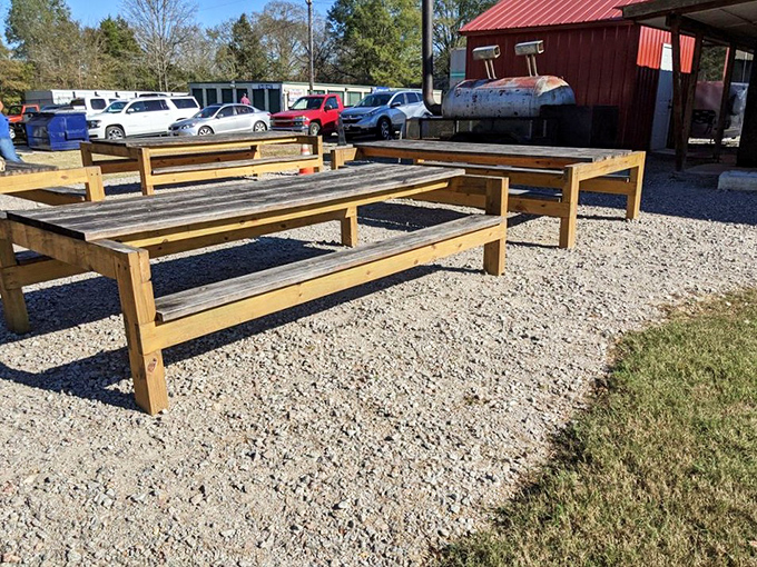 Al fresco dining, Carolina-style&mdash;these rustic wooden tables have hosted more BBQ epiphanies than a philosopher's stone bench.