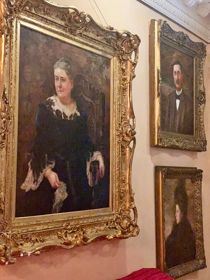 Gold-framed ancestors gaze sternly from their canvas perches, silently judging your casual attire. Those elaborate frames alone probably cost more than my first car.