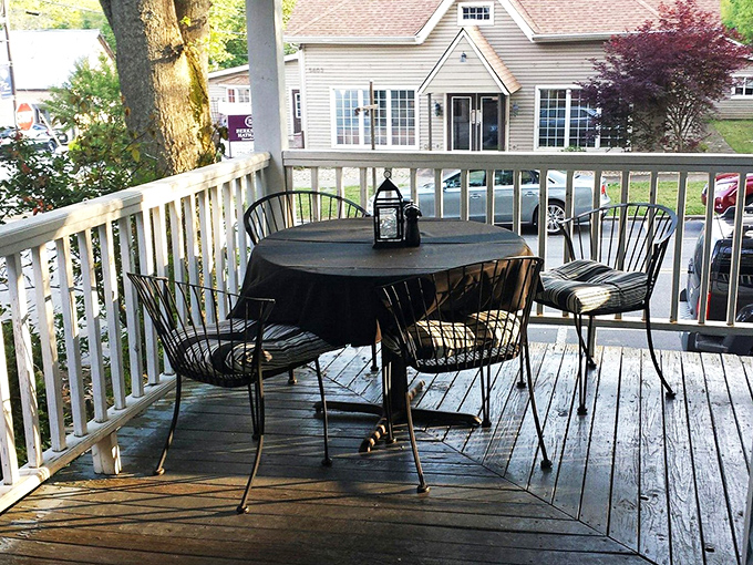 Outdoor dining that captures Georgia's charm. This porch seating offers fresh air, dappled sunlight, and the perfect setting for lingering conversations. 