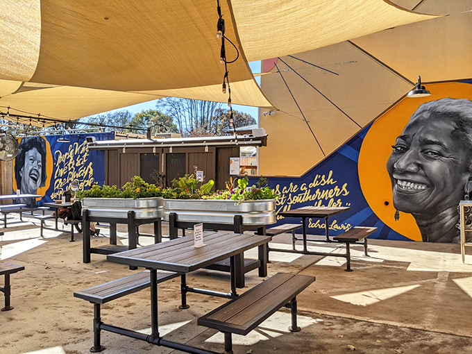 Outdoor dining under canvas sails, where the garden-to-plate philosophy isn't just talk—it's growing right beside you.