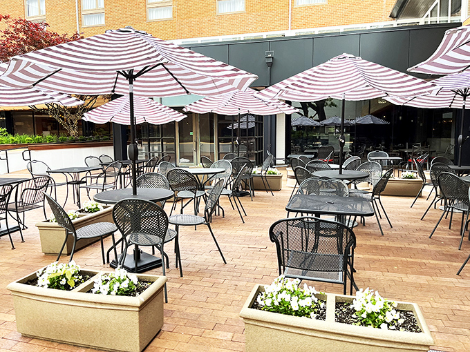 The patio at Easy Like Sunday &ndash; where vitamin D meets vitamin delicious. Those planters of white flowers are nature's way of saying "brunch here."