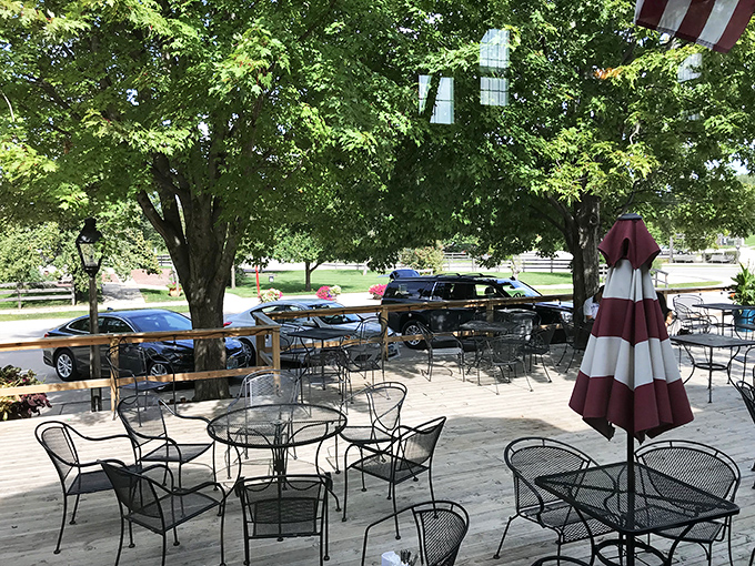 Summer in Iowa means outdoor dining under leafy sentinels. This patio practically whispers, "Stay awhile, order another round, watch the world amble by."