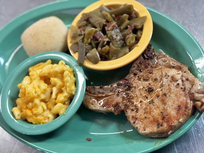 This pork chop isn't just cooked &ndash; it's been loved, alongside mac and cheese and green beans that complete comfort food's holy trinity.