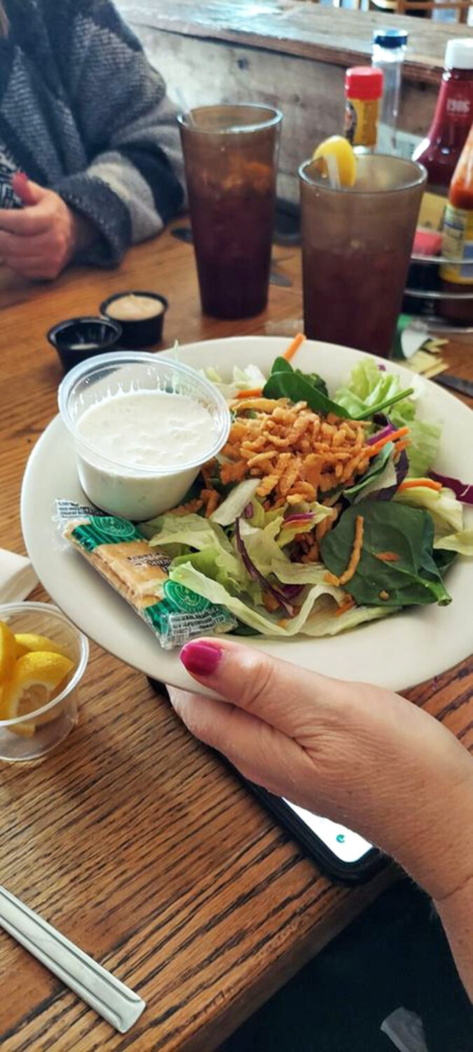 A garden-fresh salad that doesn't feel like punishment – proof that Bill's understands balance in a meal is important, even if we're really here for those mashed potatoes.