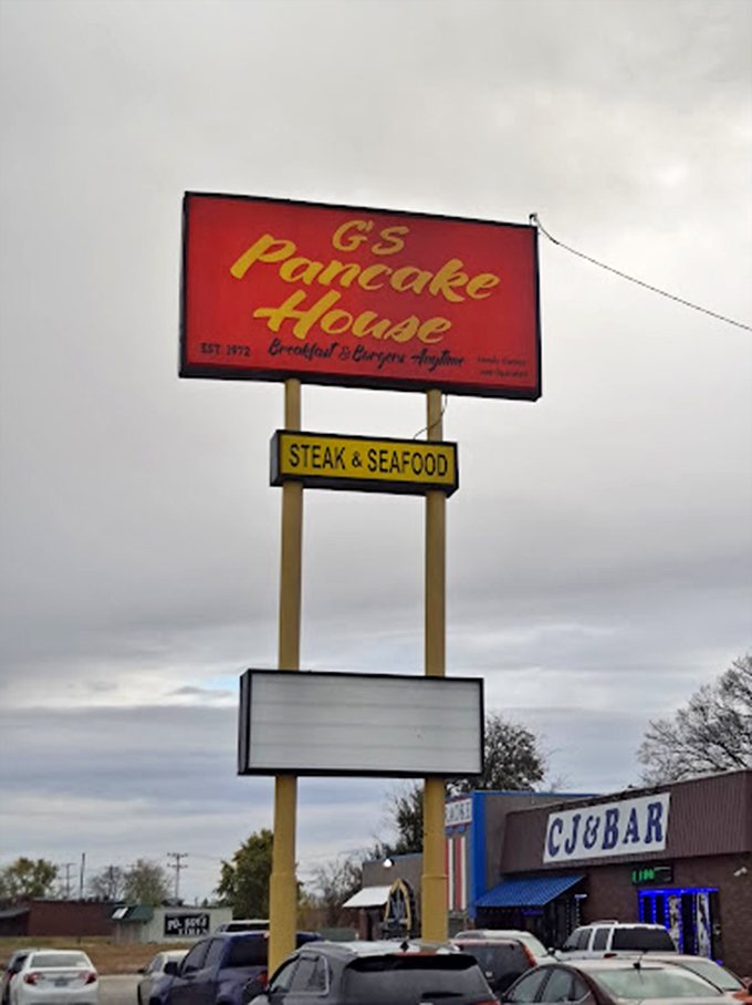 The sign promises "Breakfast & Burgers Anytime"&mdash;words that should be embroidered on a national flag of comfort.