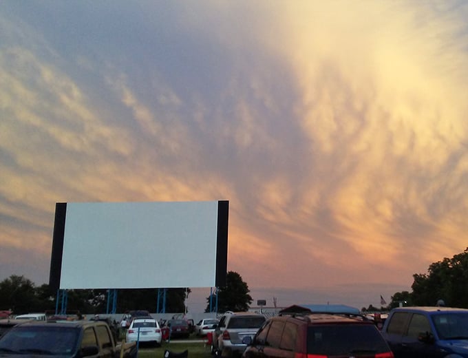Nature provides the most spectacular preview show—a sunset worthy of the theater's name creating a dramatic backdrop for the screen.