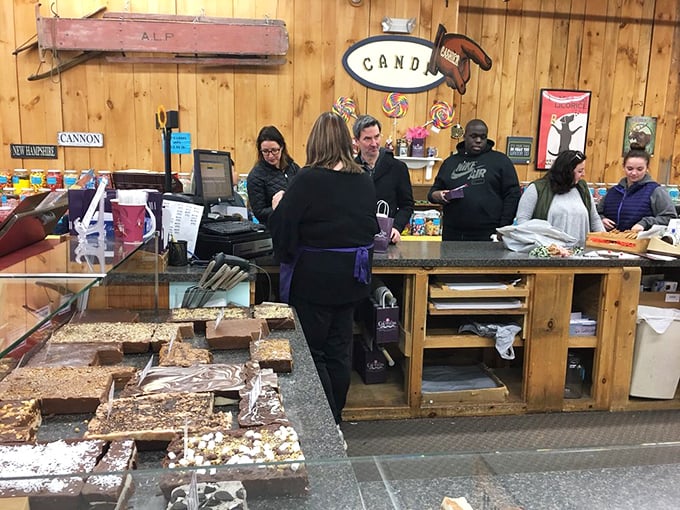 The bustling checkout counter where strangers become comrades united by their shared mission&mdash;escaping with bags of guilty pleasures.