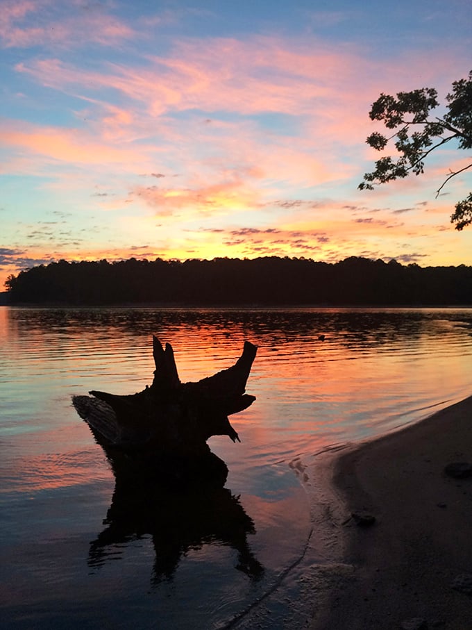 Mother Nature's sunset spectacular reflects on Jordan Lake&mdash;better than any 4K screen and with no subscription fee.
