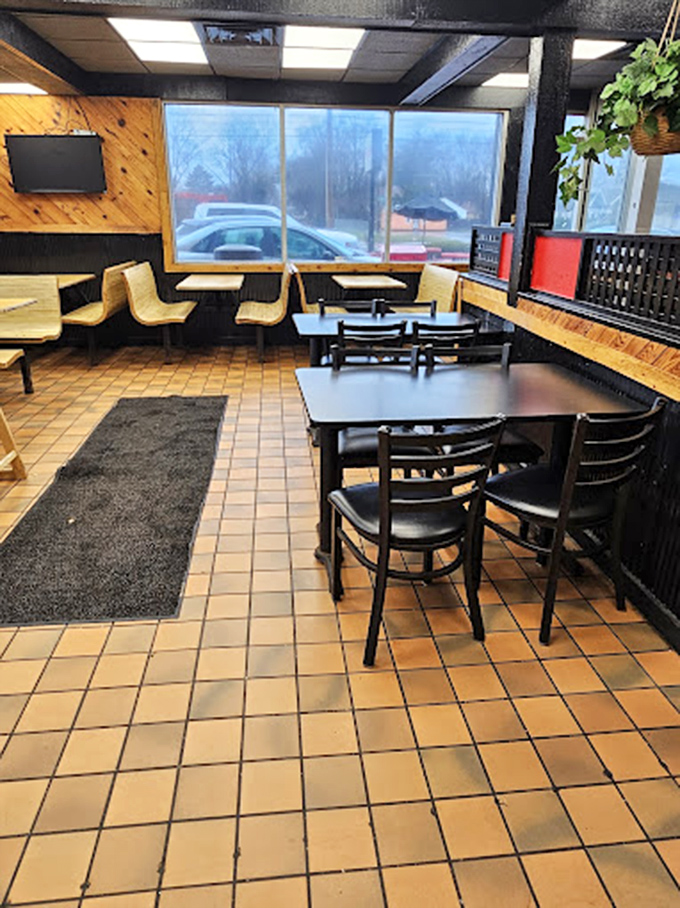 The dining room might be simple, but those wooden booths have witnessed countless "first bite" faces&mdash;that wide-eyed moment of barbecue bliss.