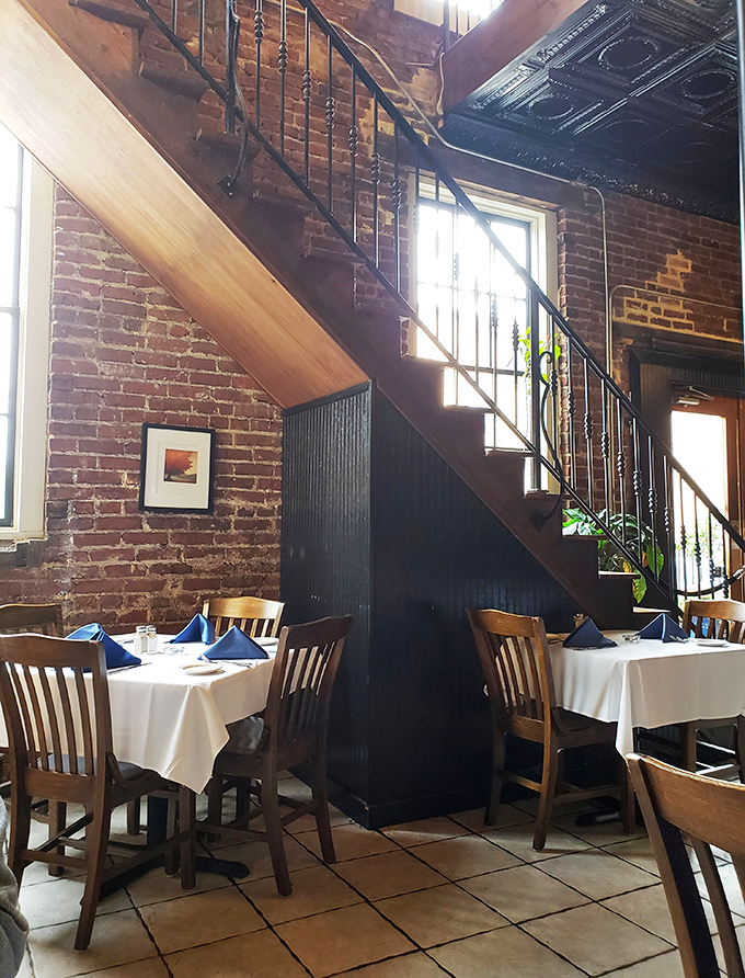 Historic staircases and exposed brick walls tell stories while you dine. If these walls could talk, they'd probably just ask for another bite of steak.