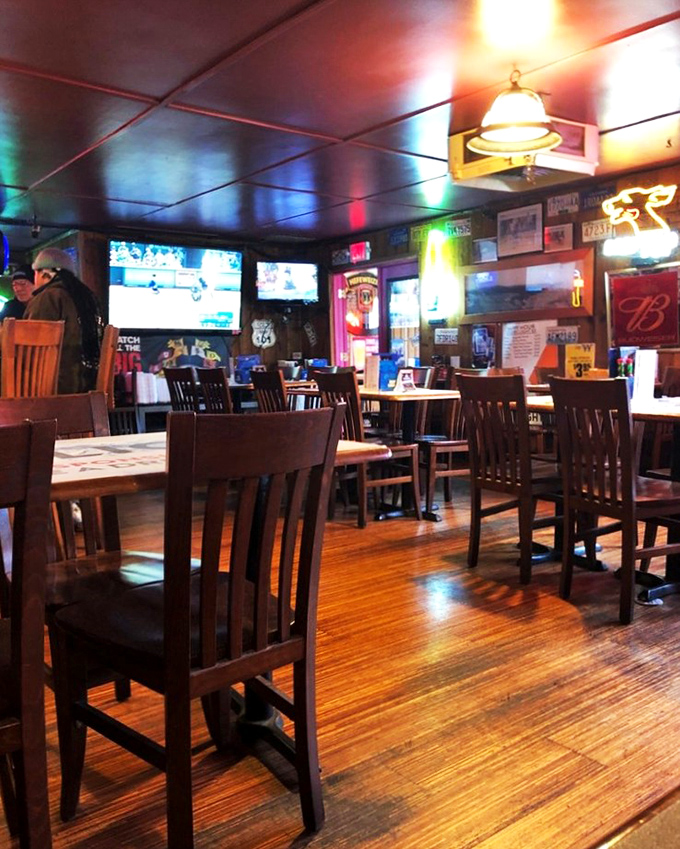 Wooden floors polished by decades of happy diners. The neon glow isn't ambiance&mdash;it's the aura of countless perfect meals.