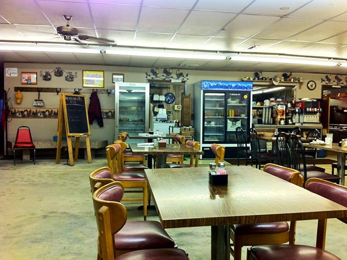 Tables arranged not by an interior designer but by decades of knowing exactly how the community likes to gather and eat together.