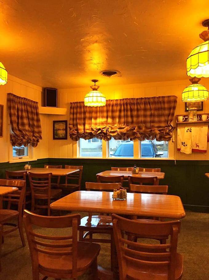 The warm glow of these dining tables feels like an invitation to sit down, stay awhile, and forget about your diet plans.