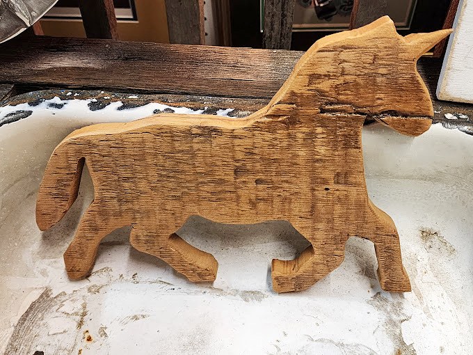 This wooden horse didn't escape from Troy &ndash; but it might gallop away with your heart as the perfect rustic accent for your bookshelf.